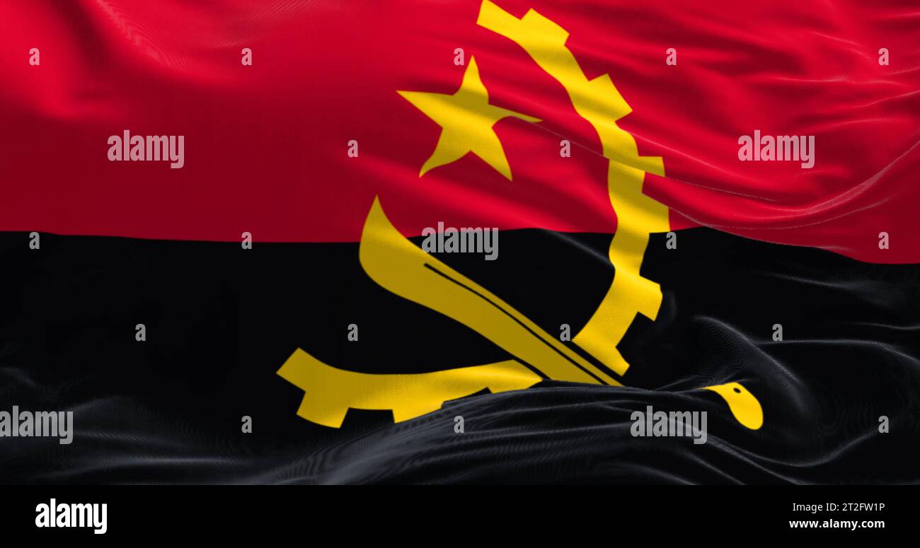 Close-up of Angola national flag waving in the wind. Two horizontal ...