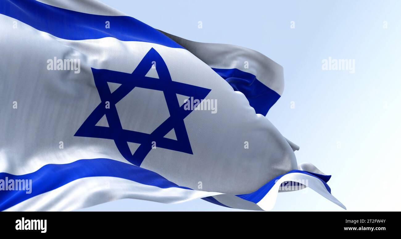 State of Israel national flag waving on a clear day. Blue Star of David ...