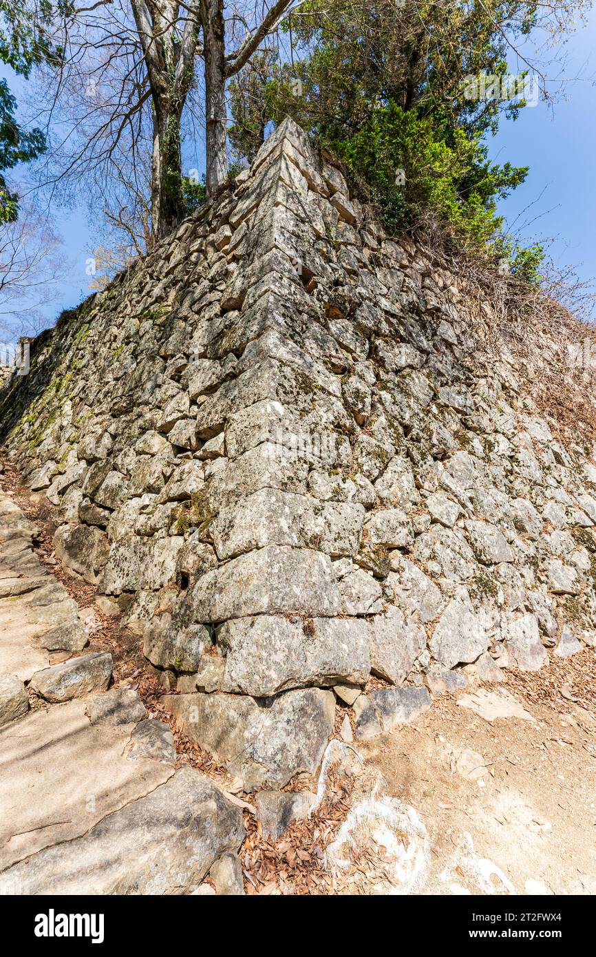 Typical example of the sangi-zumi method of stacking corner stones on ...