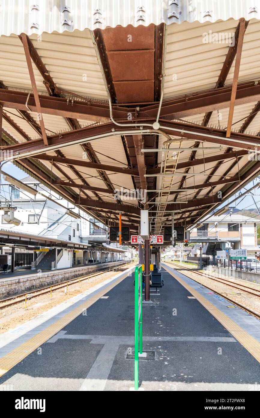 Daytime view along the platform at Bitchu-Takahashi train station with ...