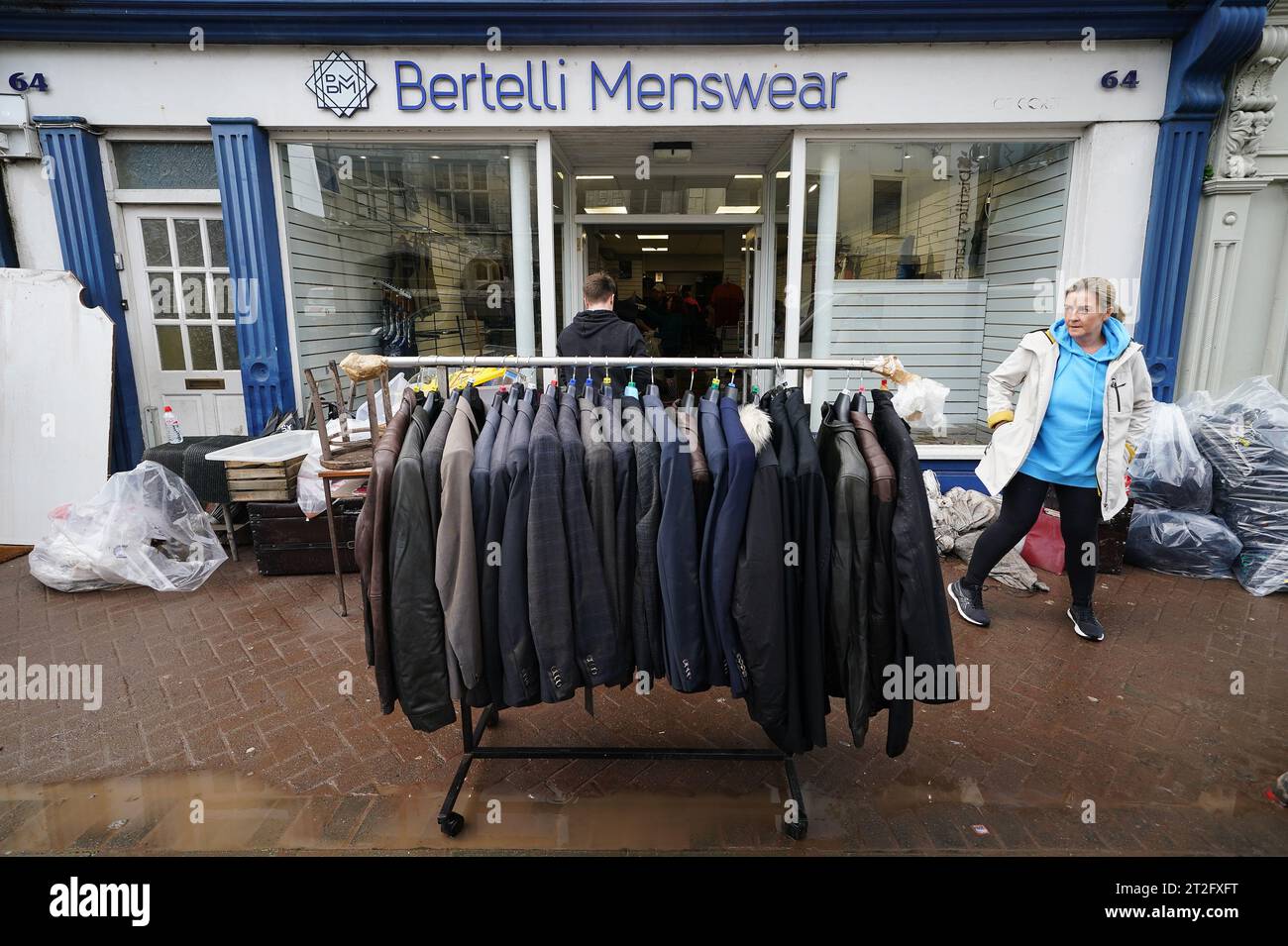 The clean up gets underway on Main street in Midleton, Co Cork, after ...