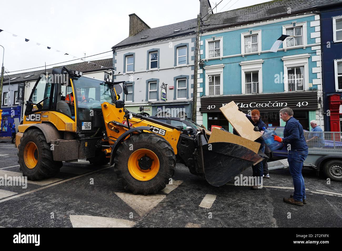 The clean up gets underway on Main street in Midleton, Co Cork, after ...