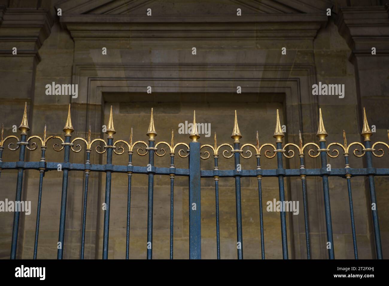 Metal gates with spikes in Louvre Palace. PARIS - 29 APRIL,2019 Stock ...