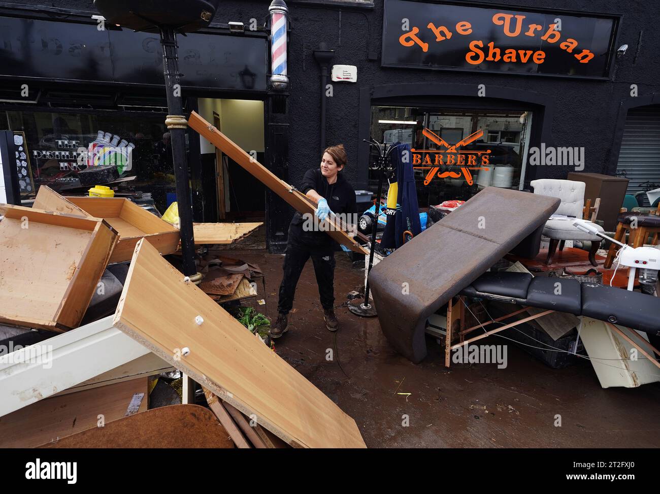 The clean up gets underway on Main street in Midleton, Co Cork, after ...