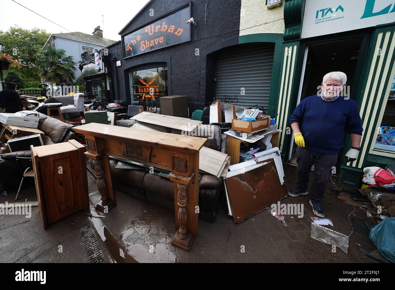 The clean up gets underway on Main street in Midleton, Co Cork, after ...