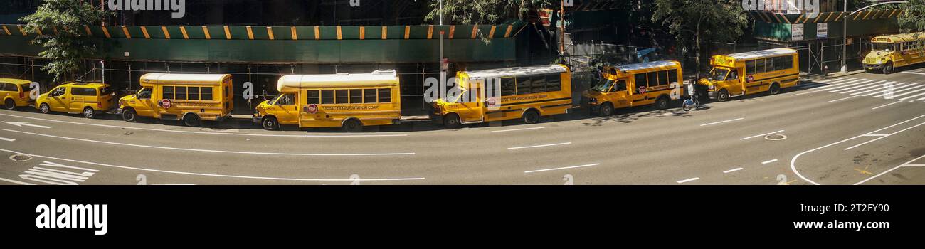 School buses park in front of PS33 in Chelsea awaiting dismissal. in ...