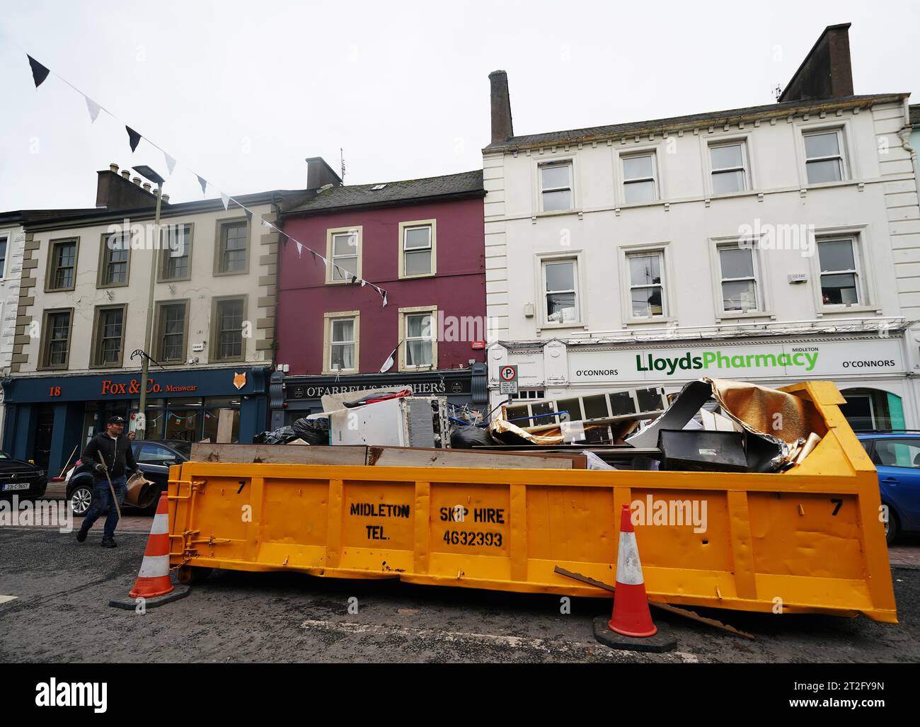 The clean up gets underway on Main street in Midleton, Co Cork, after ...
