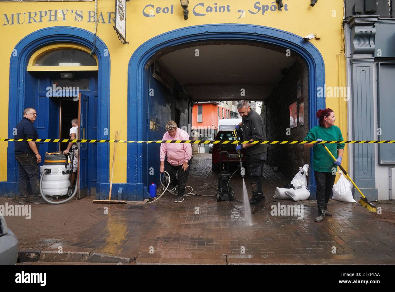 The clean up gets underway on Main street in Midleton, Co Cork, after ...