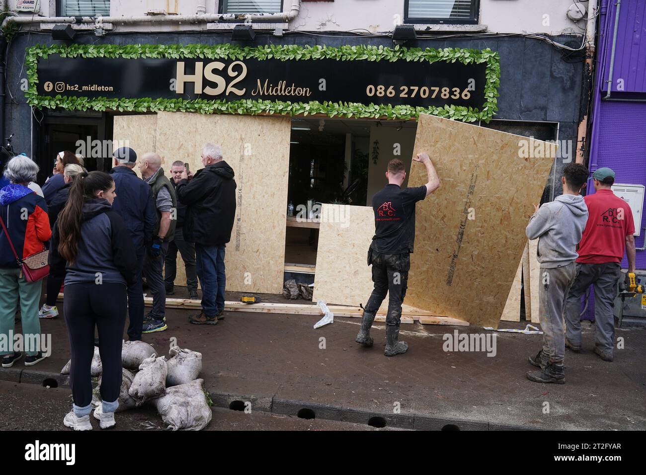 The clean up gets underway on Main street in Midleton, Co Cork, after ...