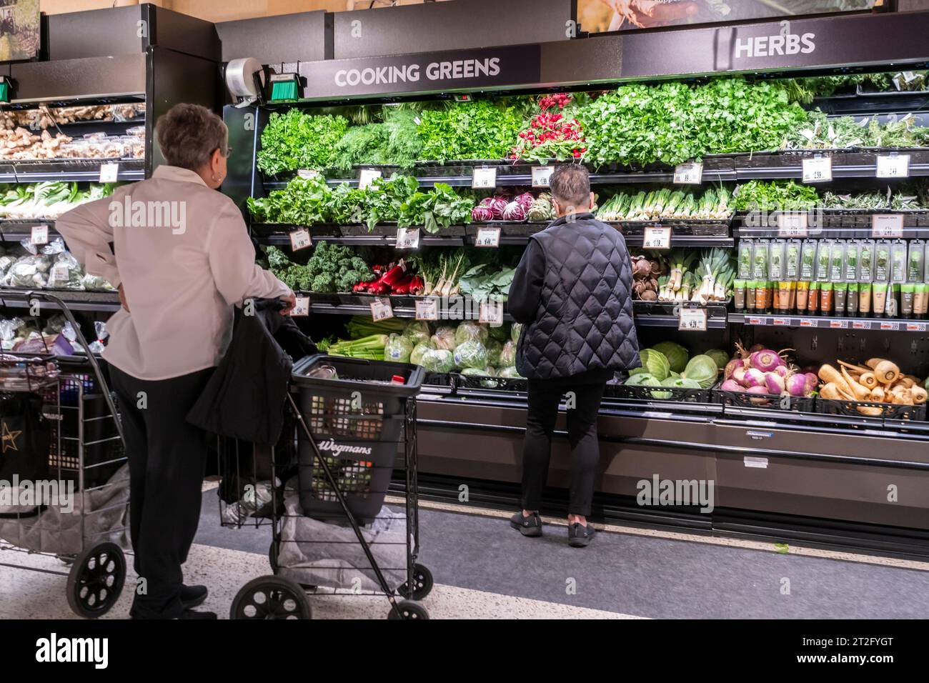 Hordes of shoppers invade the Wegmans supermarket in the East Village ...