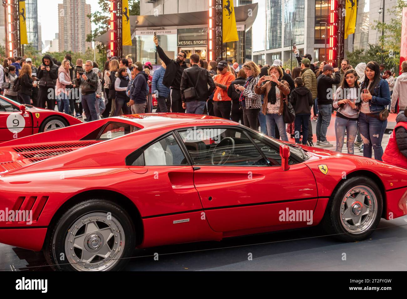 Sportscar aficionados drool over a display of Ferrari vehicles in ...