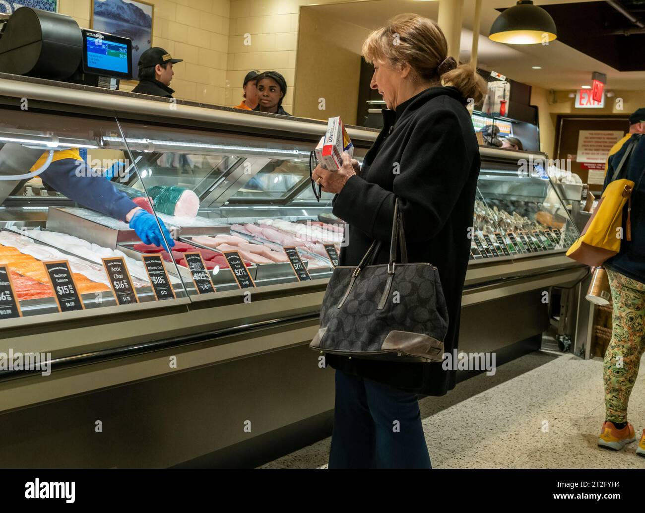 Hordes of shoppers invade the Wegmans supermarket in the East Village ...