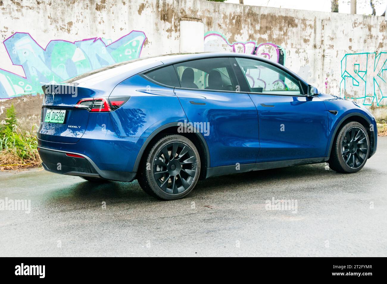 Stationary picture of a made in China Tesla Model Y on a test drive in ...