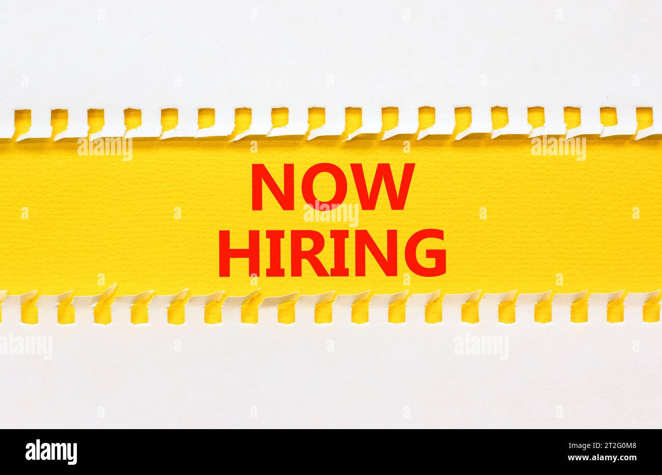 Now hiring symbol. Concept words Now hiring on beautiful yellow paper ...