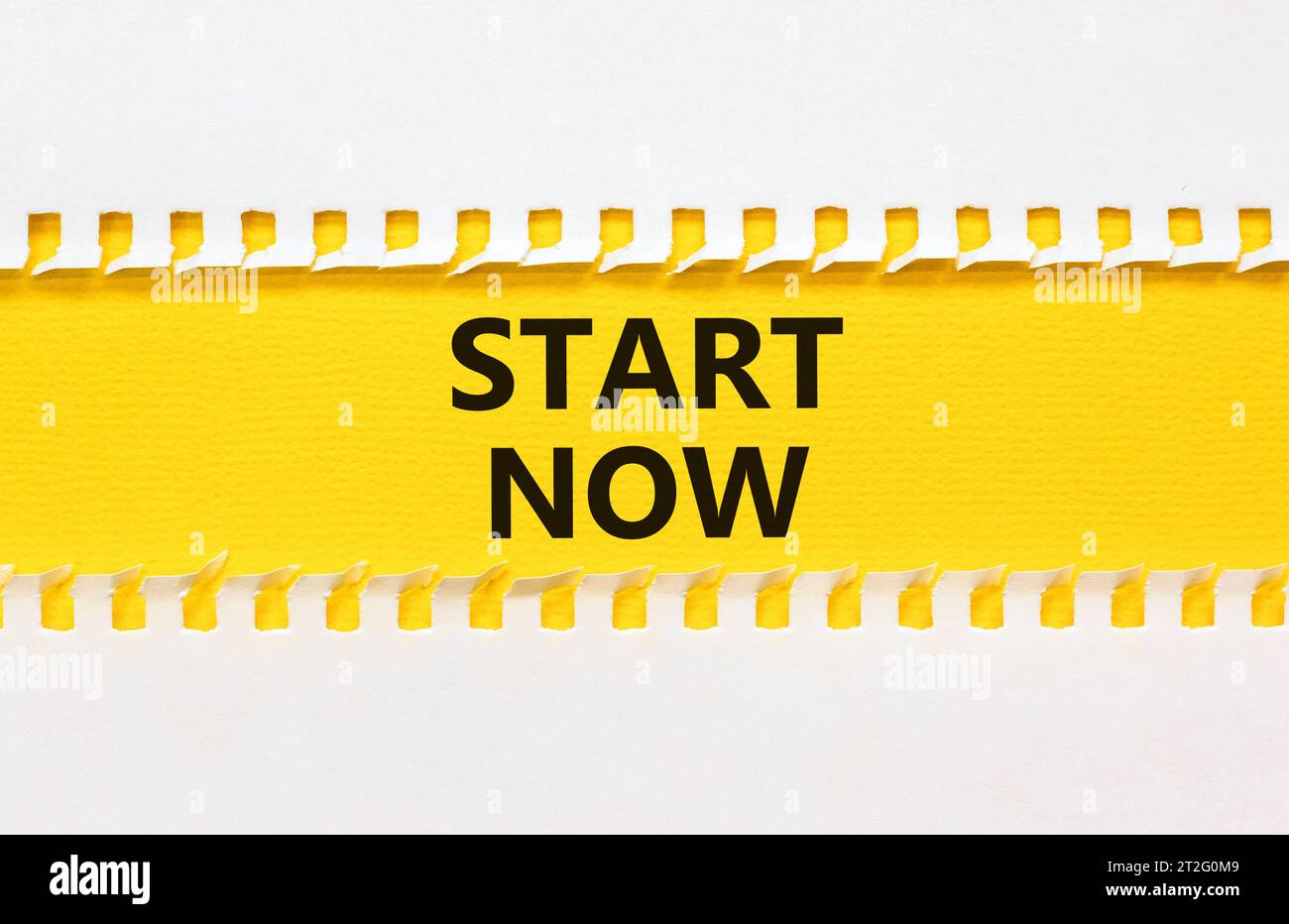 Start now symbol. Concept words Start now on beautiful yellow paper ...