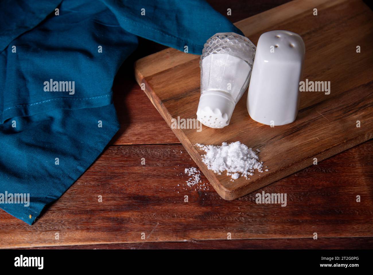Glass salt shaker on the table Stock Photo - Alamy