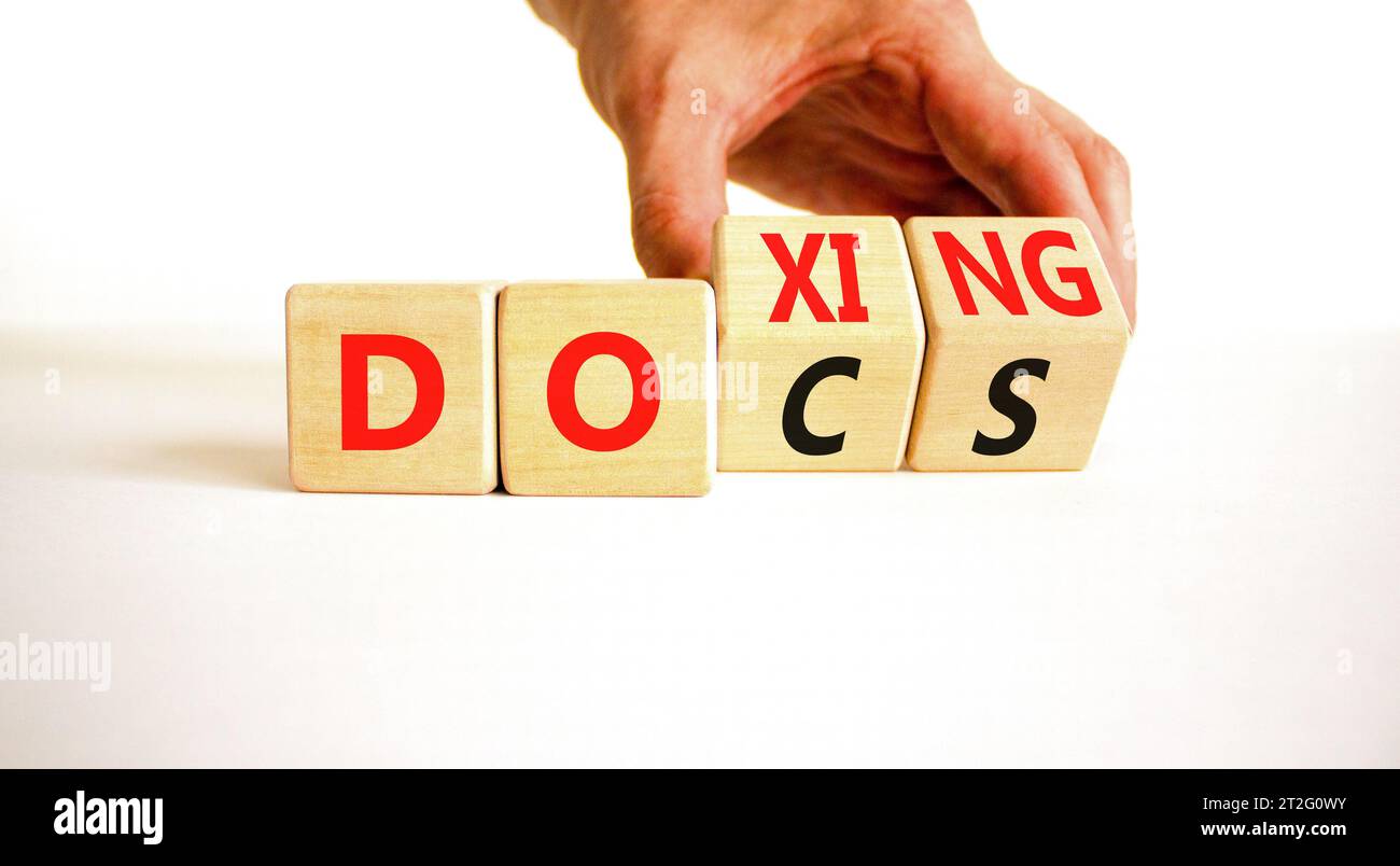 Docs or doxing symbol. Concept words Docs Doxing on wooden block ...
