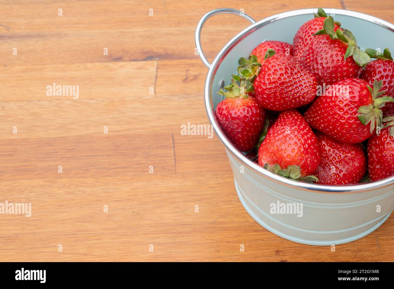 Fresh organic strawberries just picked from the garden in within a ...