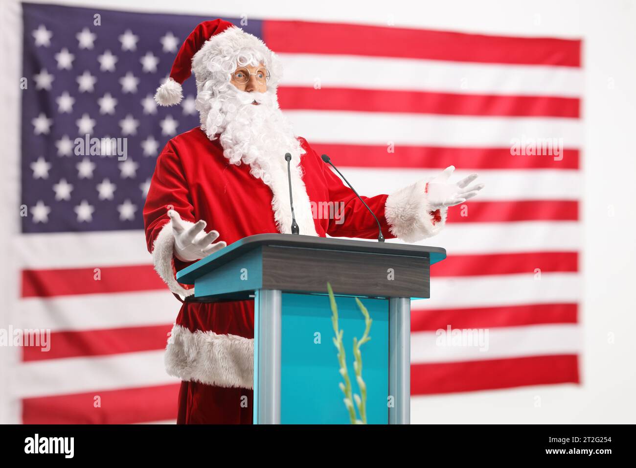 Santa claus giving a speech on a pedestal in front of a USA flag Stock ...