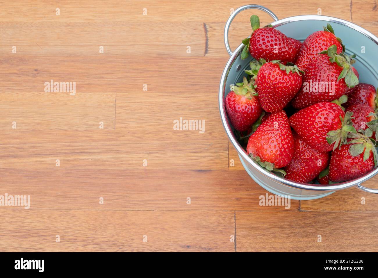 Fresh organic strawberries just picked from the garden in within a ...