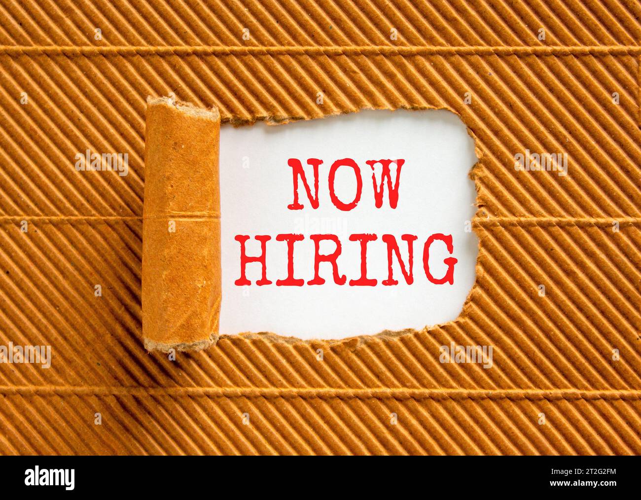 Now hiring symbol. Concept words Now hiring on beautiful white paper ...