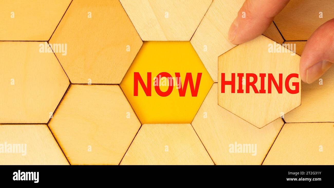 Now hiring symbol. Concept words Now hiring on beautiful wooden puzzle ...