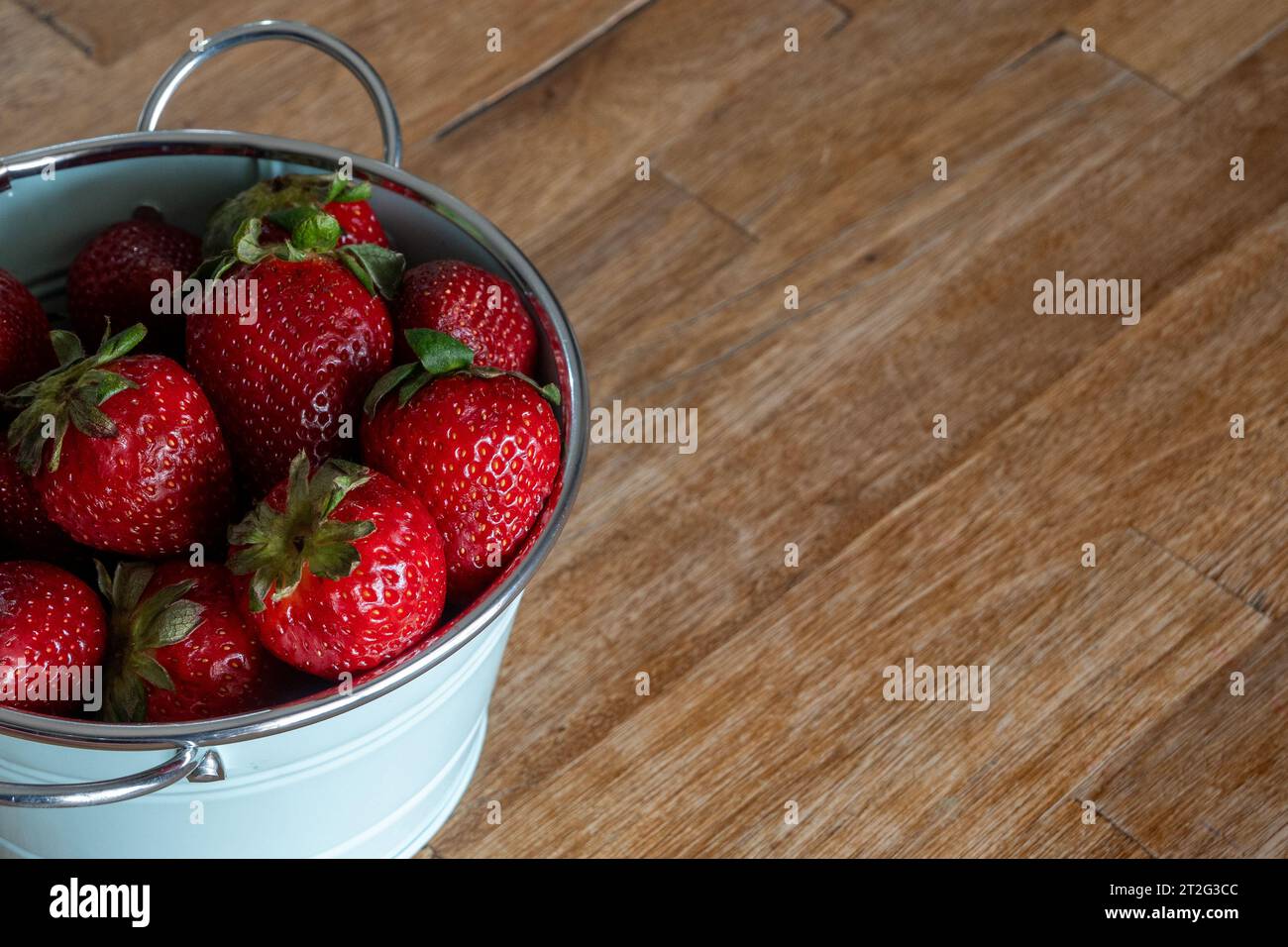 Fresh organic strawberries just picked from the garden in within a ...