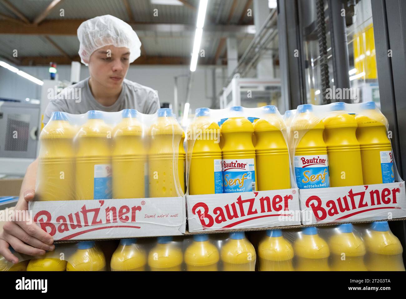 Bautzen, Germany. 19th Oct, 2023. An employee sorts portion bottles of ...