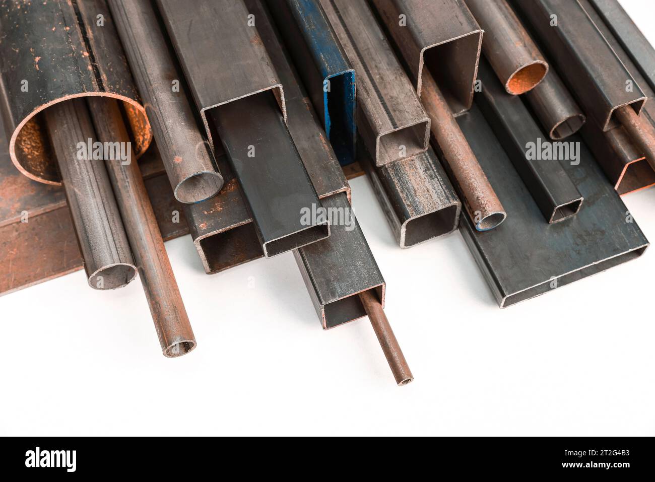 tubular metal in different sections on a white background Stock Photo ...