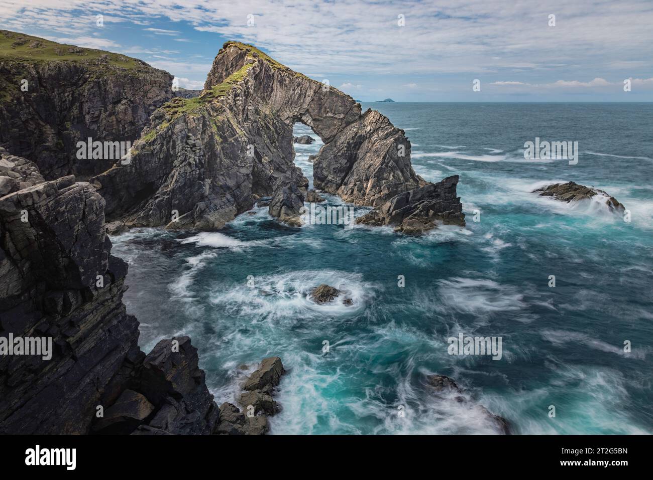 Stac a’ Phris Arch, a towering natural rock arch on the Isle of Lewis ...