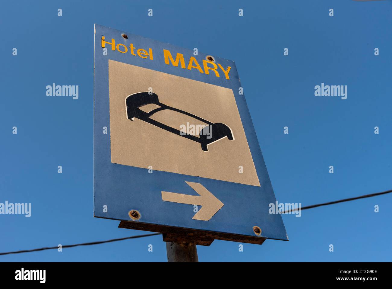 Crete, Greece, Europe. 01.10.2023. Hotel sign showing an empty bed in ...