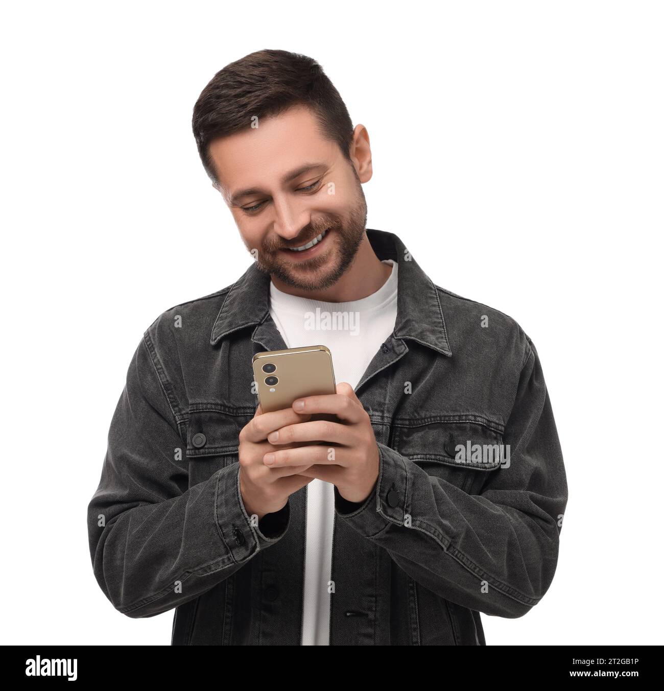 Happy man sending message via smartphone on white background Stock ...