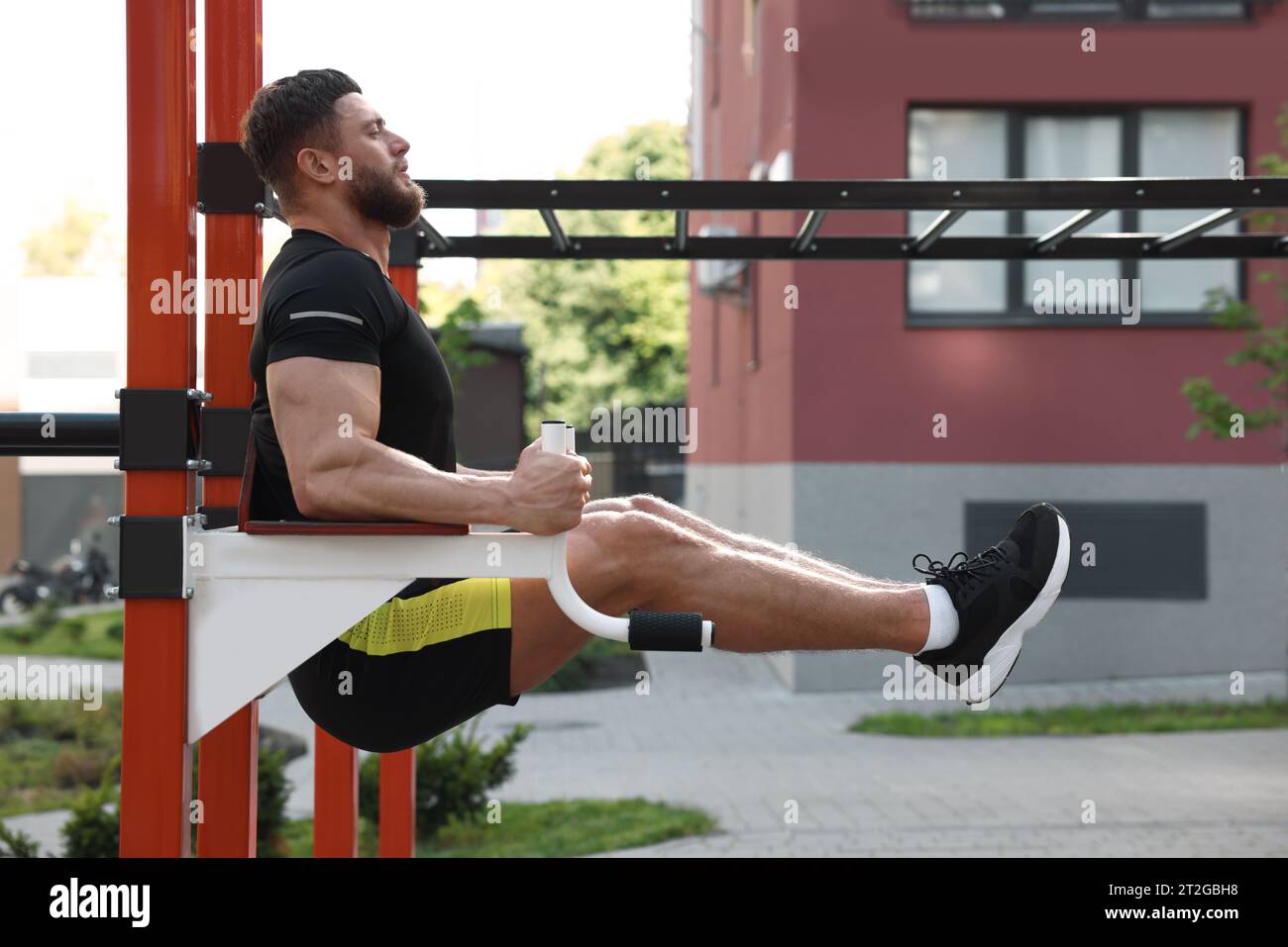 Gym machine leg lift hi-res stock photography and images - Alamy