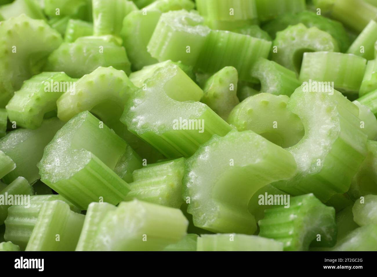 Fresh green cut celery as background, closeup Stock Photo - Alamy