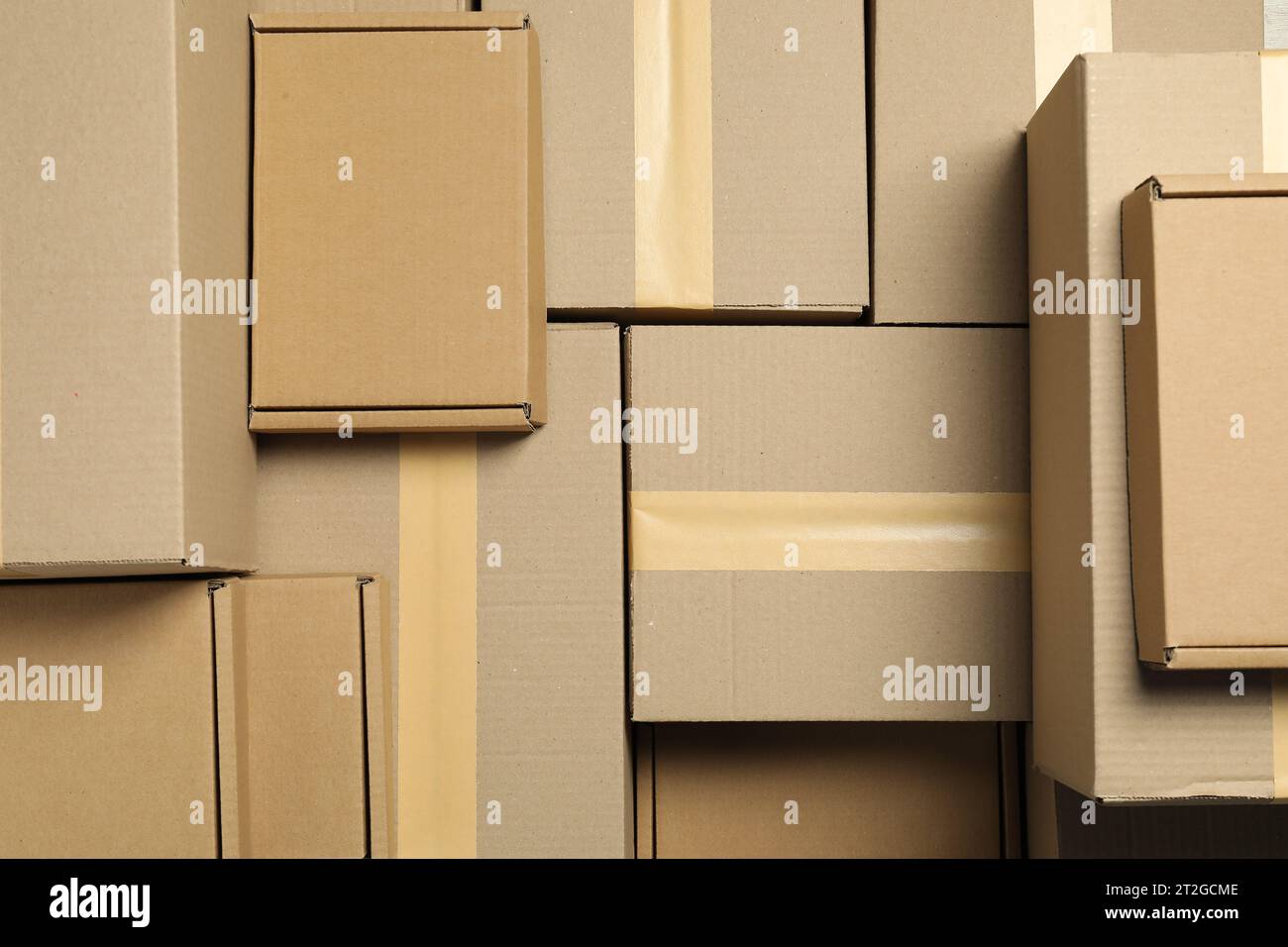 Many cardboard boxes as background, top view. Packaging goods Stock ...