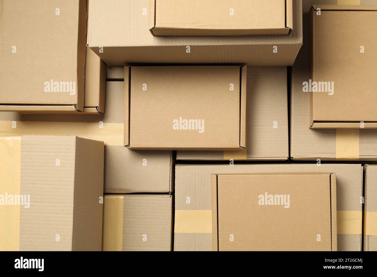 Many cardboard boxes as background, top view. Packaging goods Stock ...