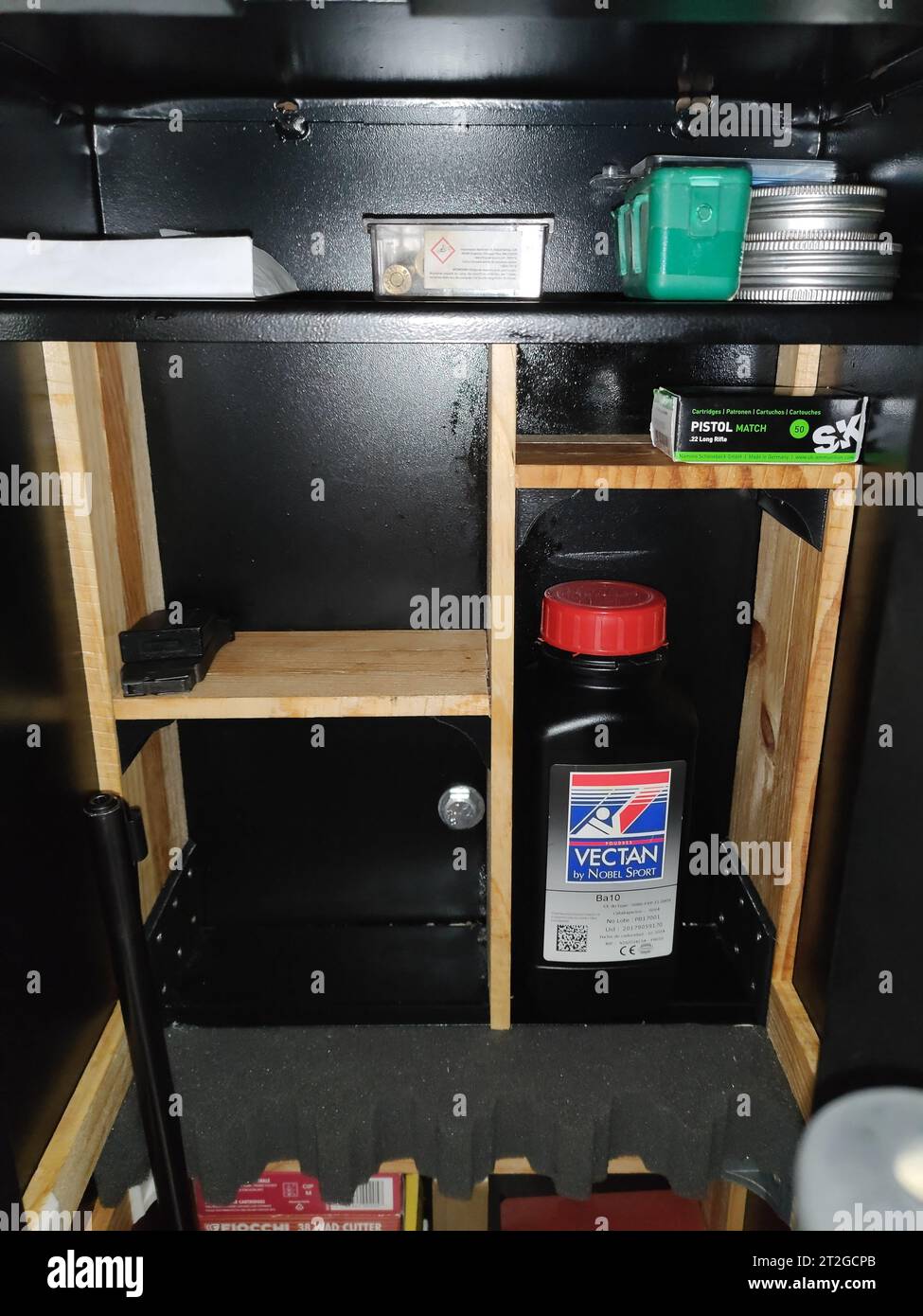 Detail of the organization of a safe inside, wooden shelves have been ...