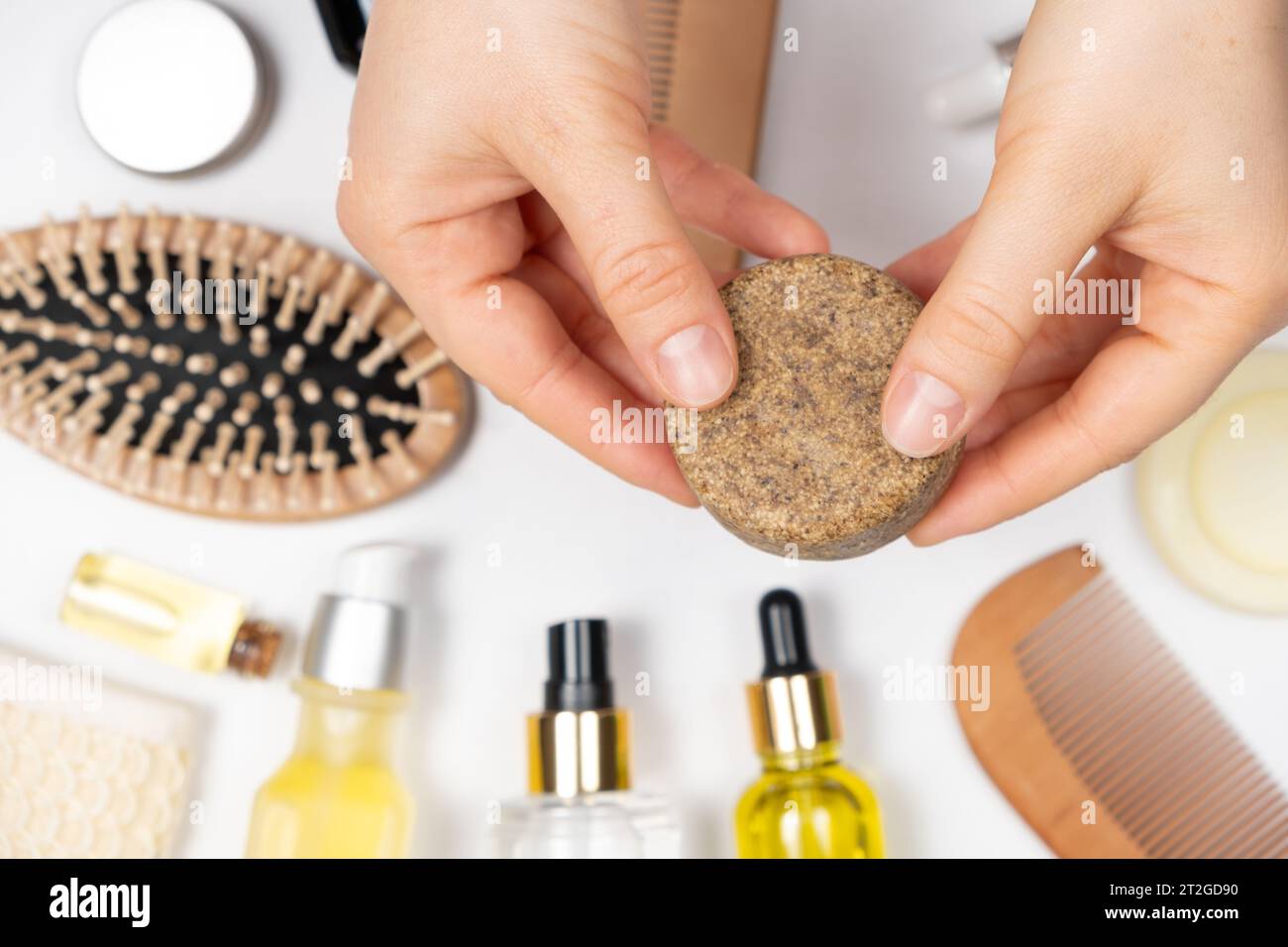 Solid shampoo in female hands. Natural eco-cosmetics without plastic ...