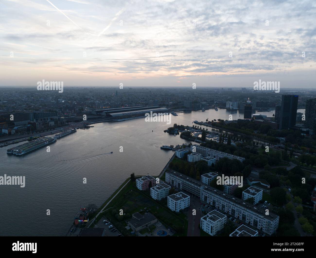 Aerial drone view of Amsterdam city skyline at night Stock Photo - Alamy