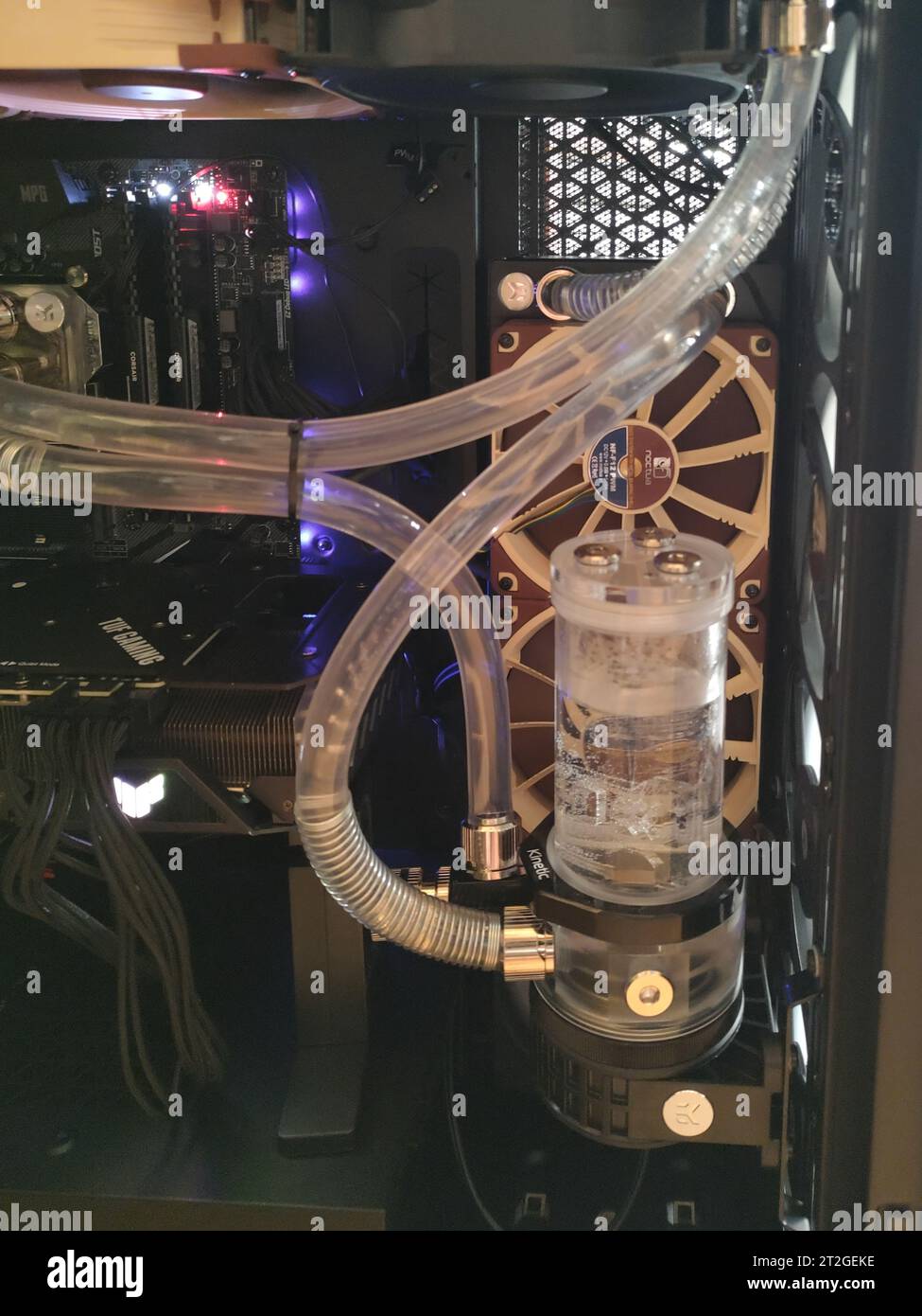 Detail of the water tank with pump for the computer cooling circuit ...