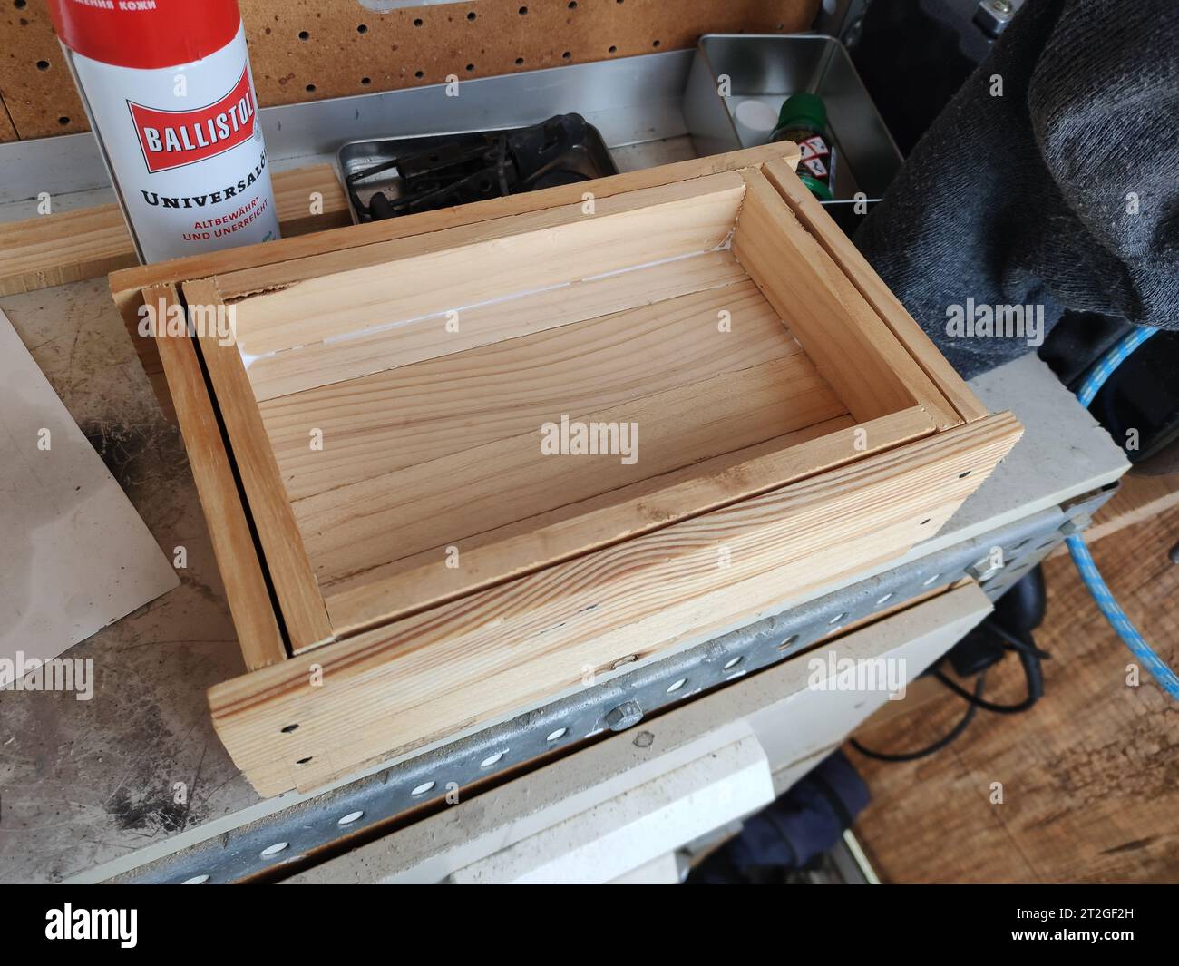 Detail of the inside of a concentric wooden box, dividers and ...