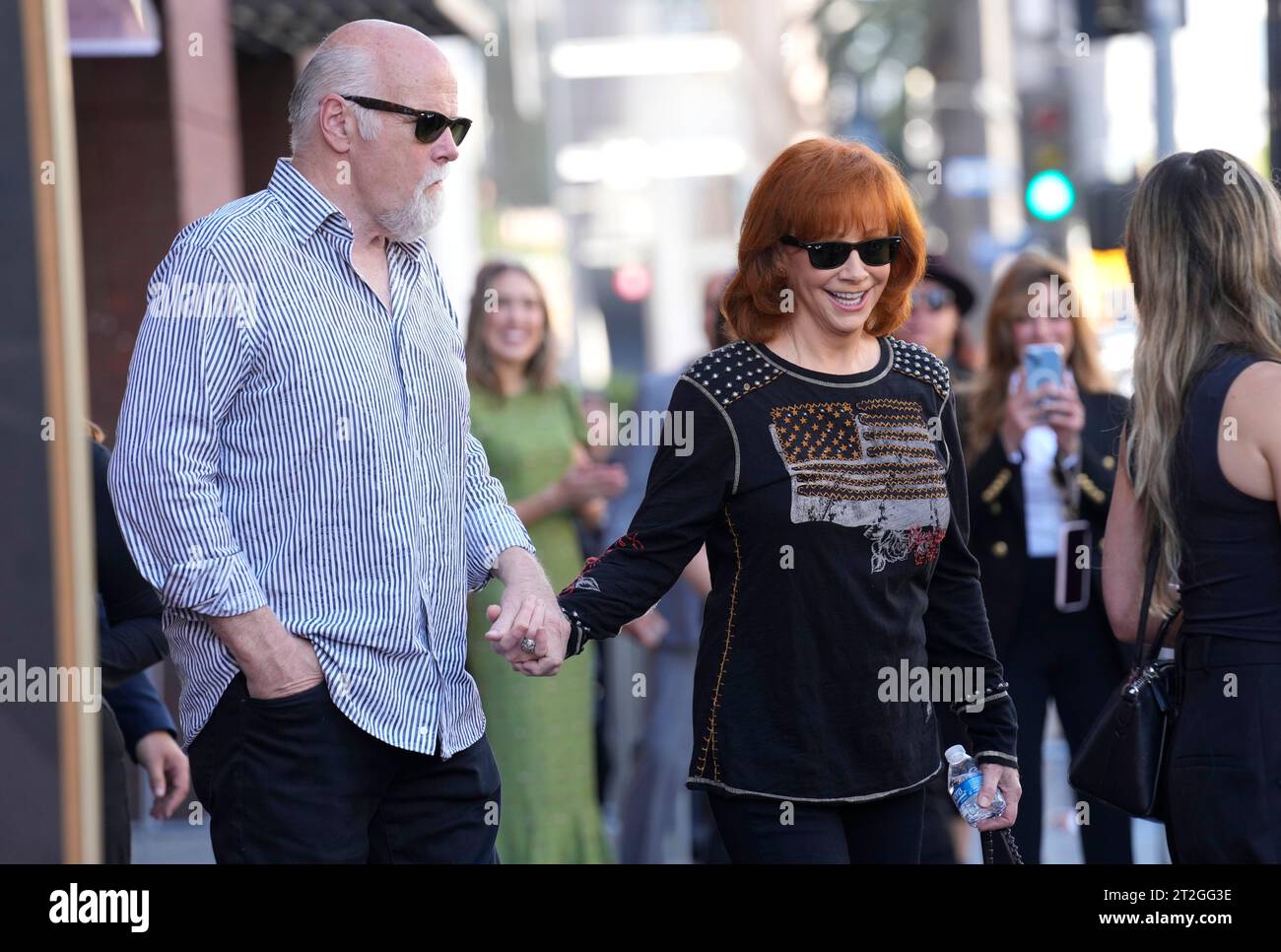 Rex Linn, left, and Reba McEntire attend a ceremony honoring Gwen ...