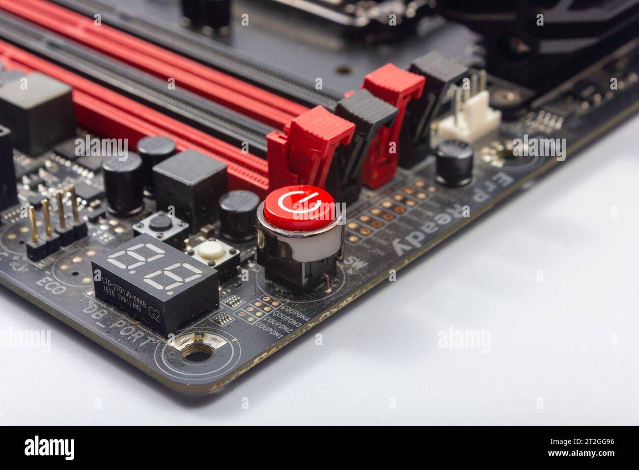 Gaming motherboard without CPU, red details, power switch, POST, on ...