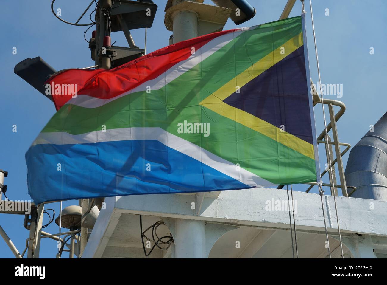 South African flag fluttering on the wind and hanging on the ...