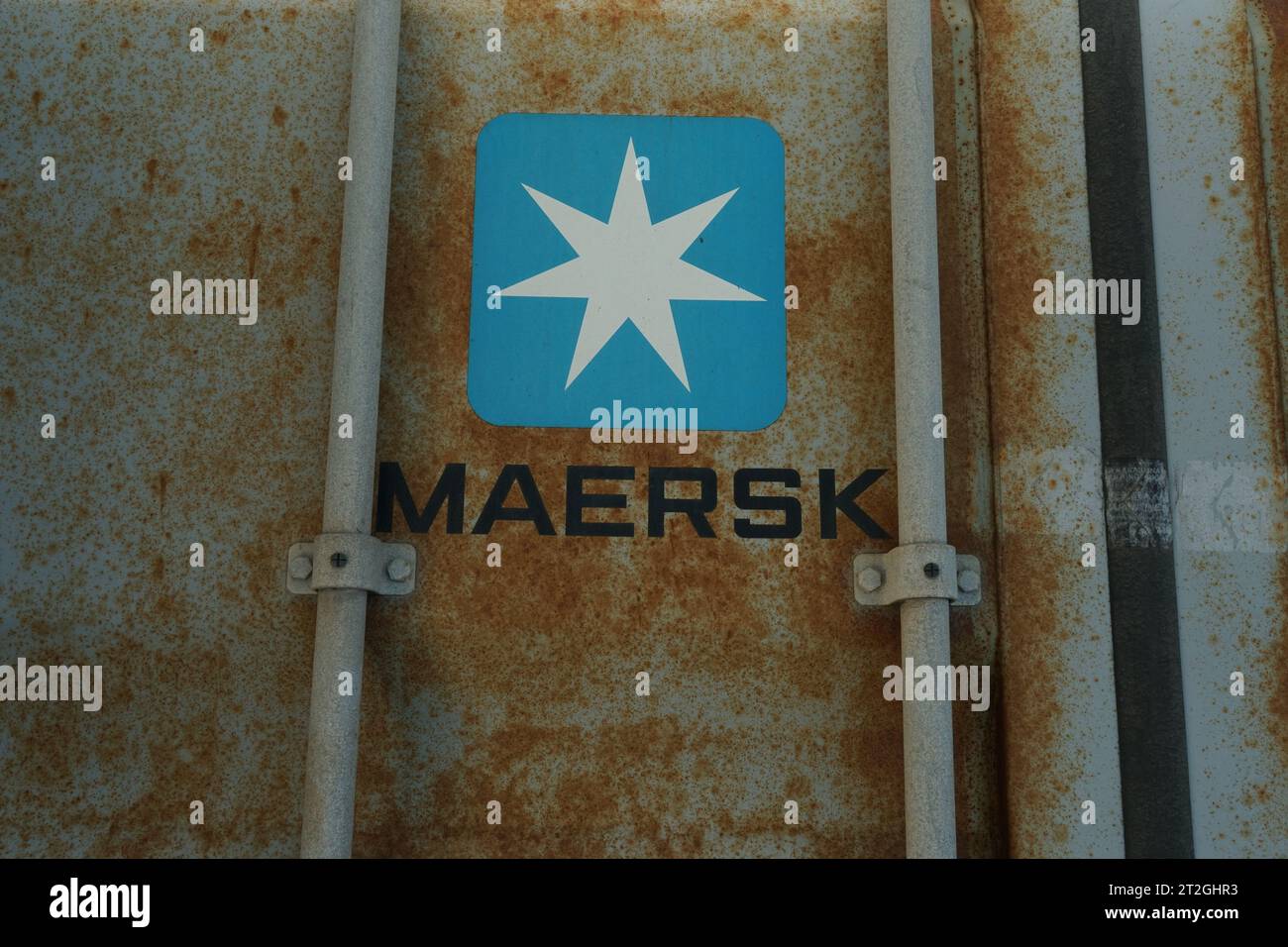 The iconic logo of Maersk shipping company, the white seven-pointed ...