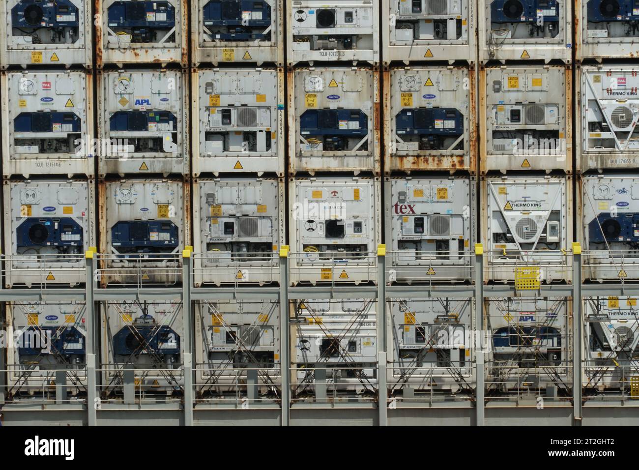 White reefer containers of various shipper stowed and secured on the ...