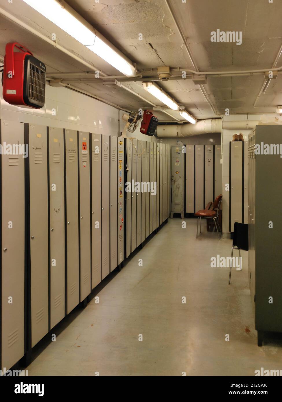 View of the locker room full of lockers of a factory, they are in a ...