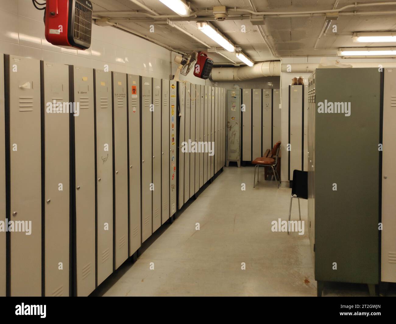 View of the locker room full of lockers of a factory, they are in a ...