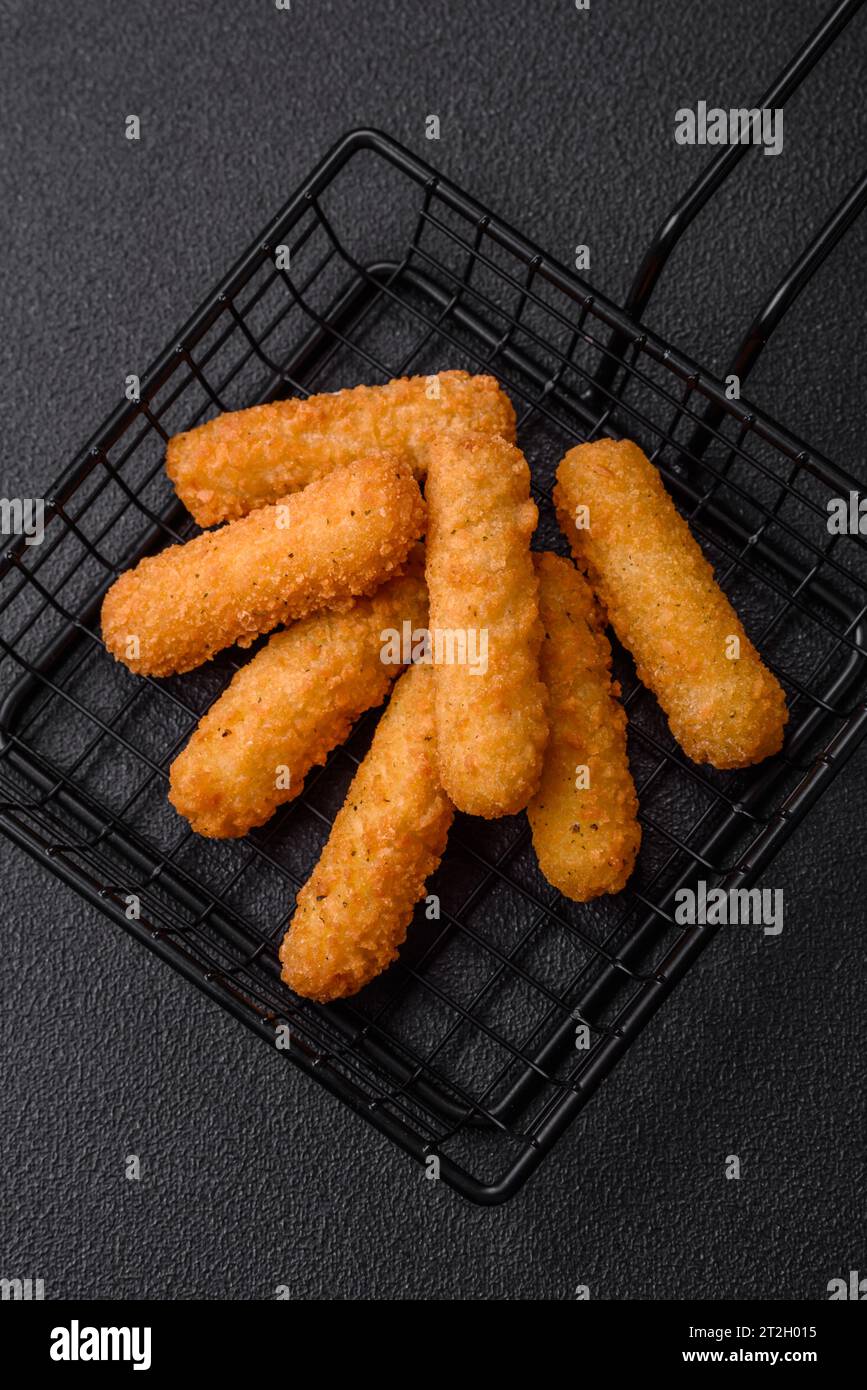 Delicious crispy cheese sticks with mozzarella, salt and spices ...