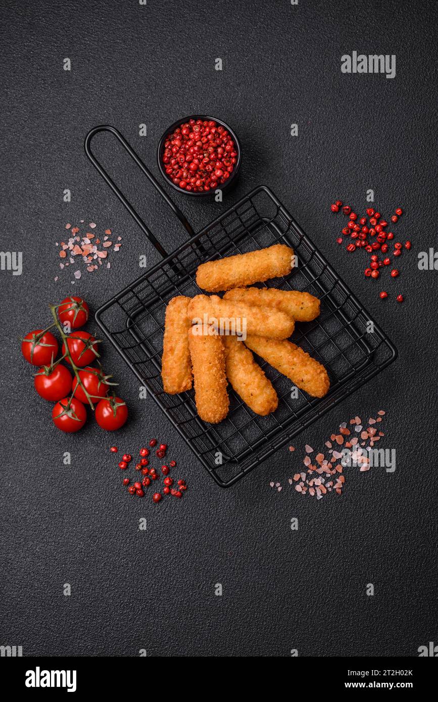 Delicious crispy cheese sticks with mozzarella, salt and spices ...